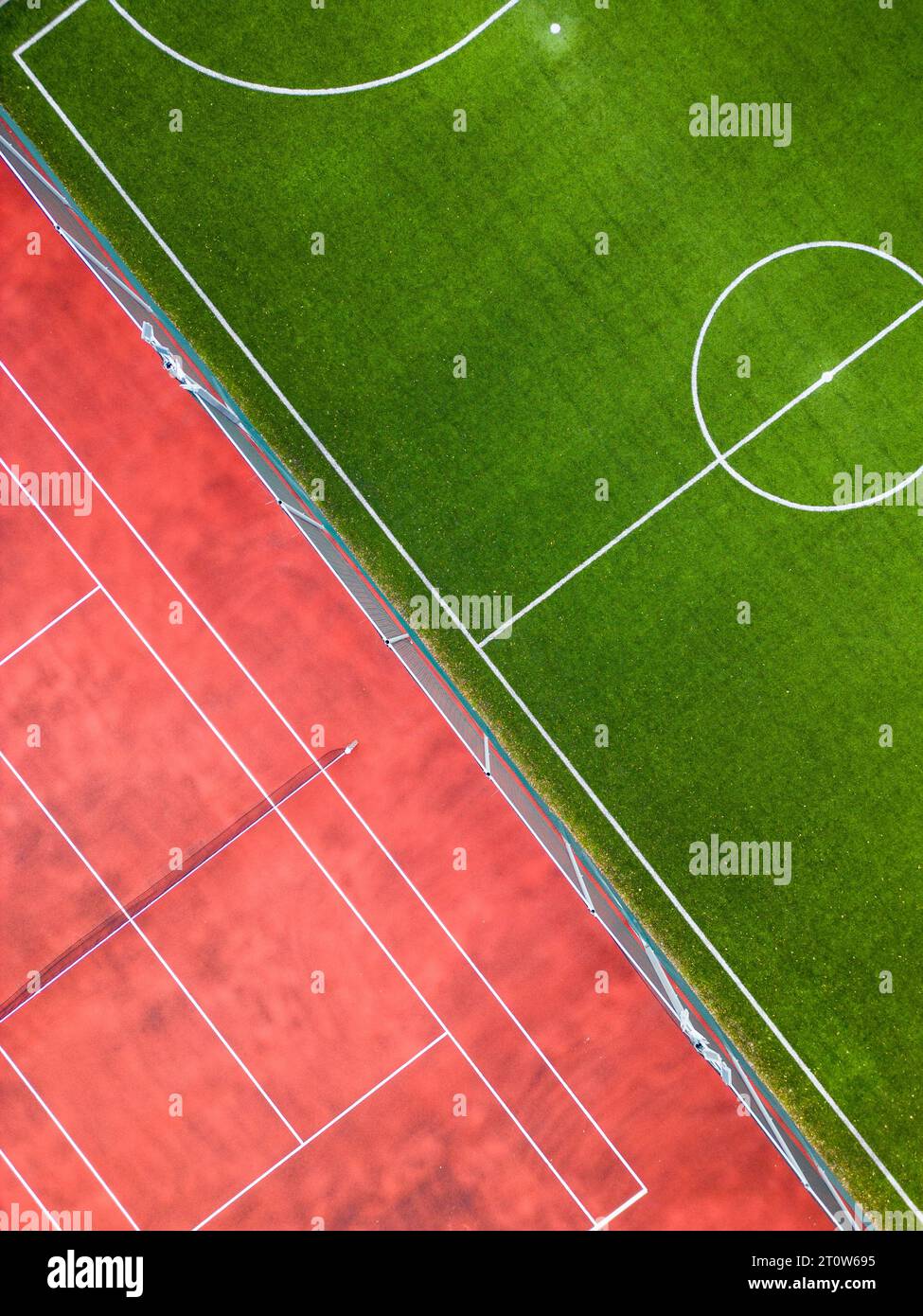 Aerial view of a soccer field and a tennis court, spaces for activity ...