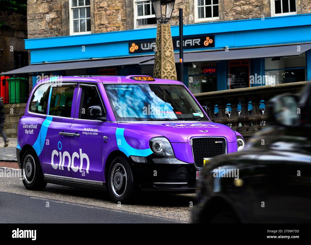 Purple Taxi in Edinburgh Stock Photo - Alamy