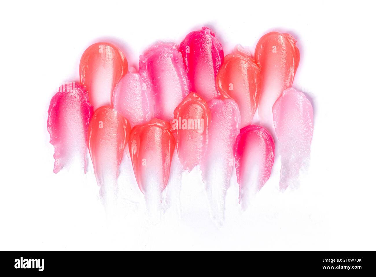 Set with make up cosmetics swatches ipstick, lip gloss on white ...