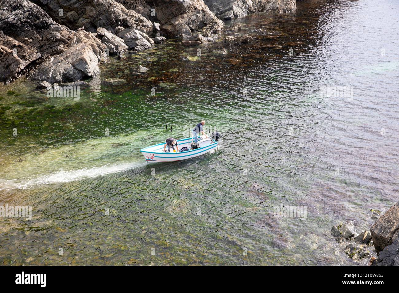 Cadgwith village on the Lizard Peninsula, Cornwall,England fishermen in ...