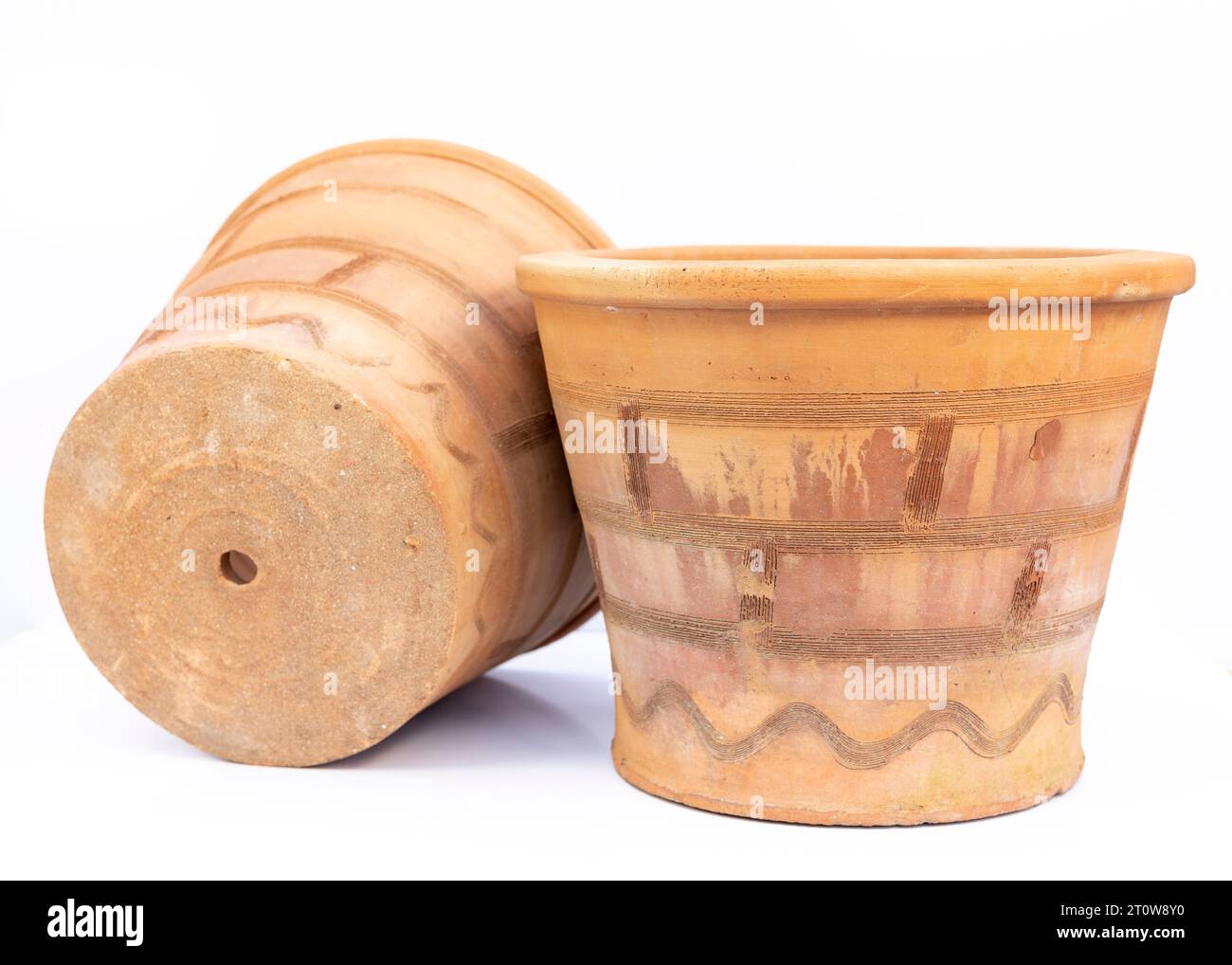 Large clay pots on white background Stock Photo - Alamy