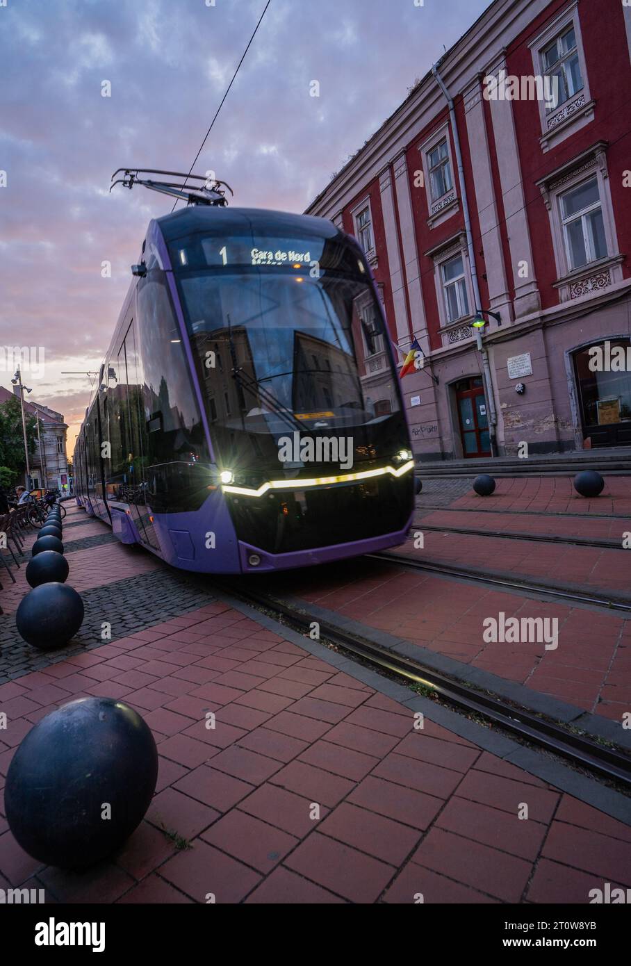 Electric city tram in Timisoara Romania Stock Photo - Alamy