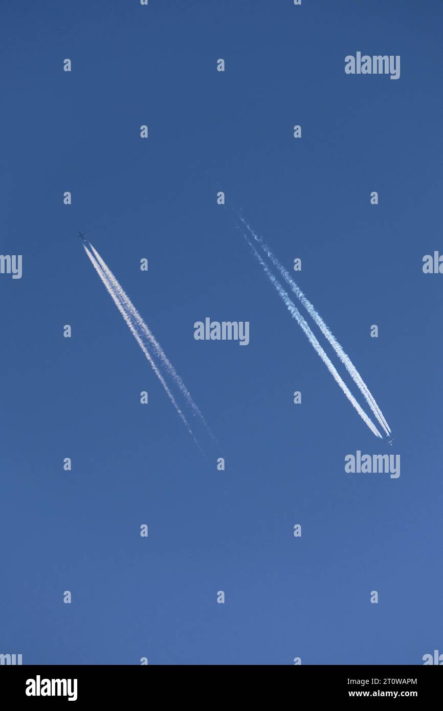 contrail in the sky from two aircraft Stock Photo - Alamy