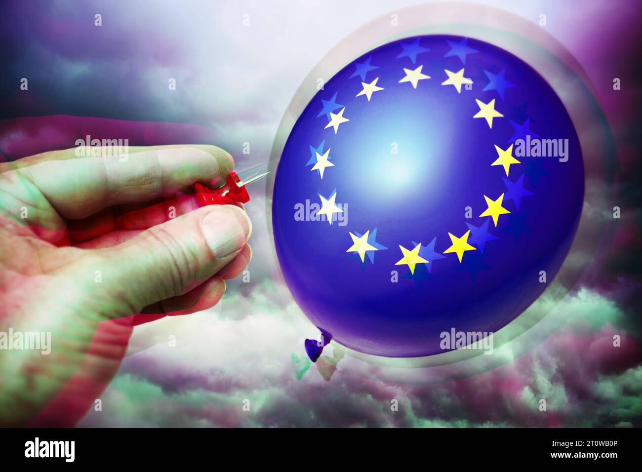 FOTOMONTAGE, EU-Ballon und Hand mit Nadel, Symbolfoto EU-Streit und ...