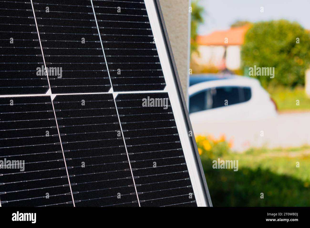 Solar panels on a well-exposed wall of an individual house, making ...
