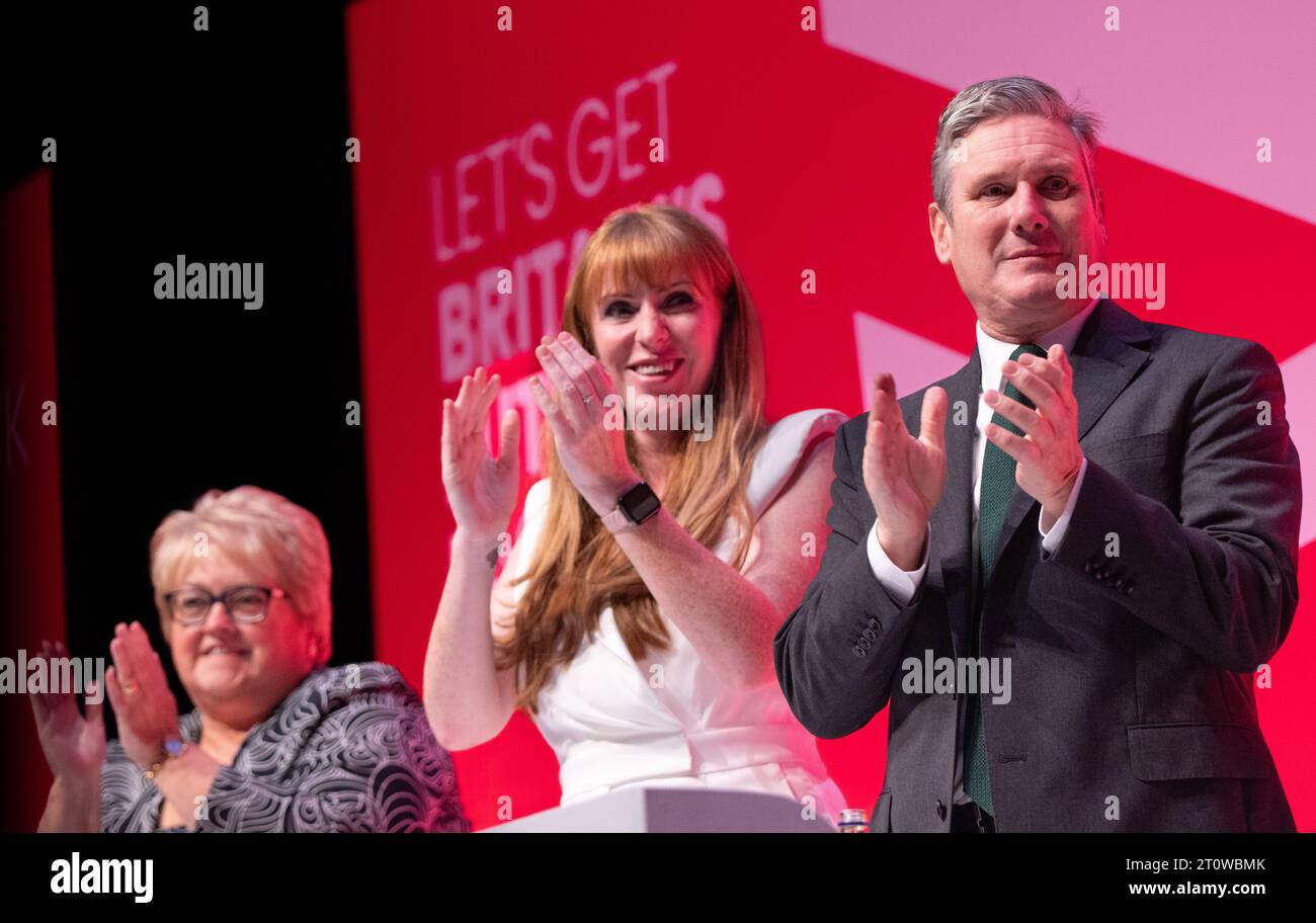 Keir Starmer and Angela Rayner listen and applaud Rachel Reeves ...