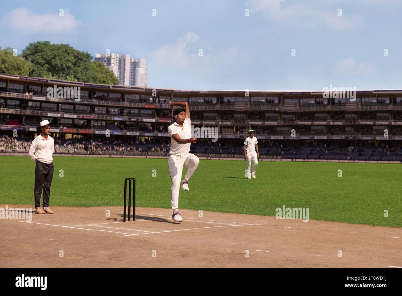 Spin Bowler about to deliver a ball from the crease, during a cricket ...