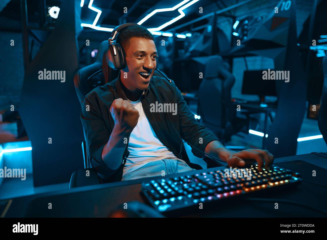 Victory in the cyber game. Portrait of a man who won Stock Photo - Alamy