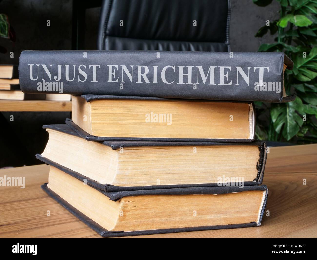 Stack of books with a law about unjust enrichment on it Stock Photo - Alamy