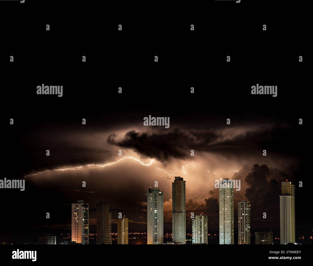 Stunning horizontal lightning bolt over city skyline at night Stock ...