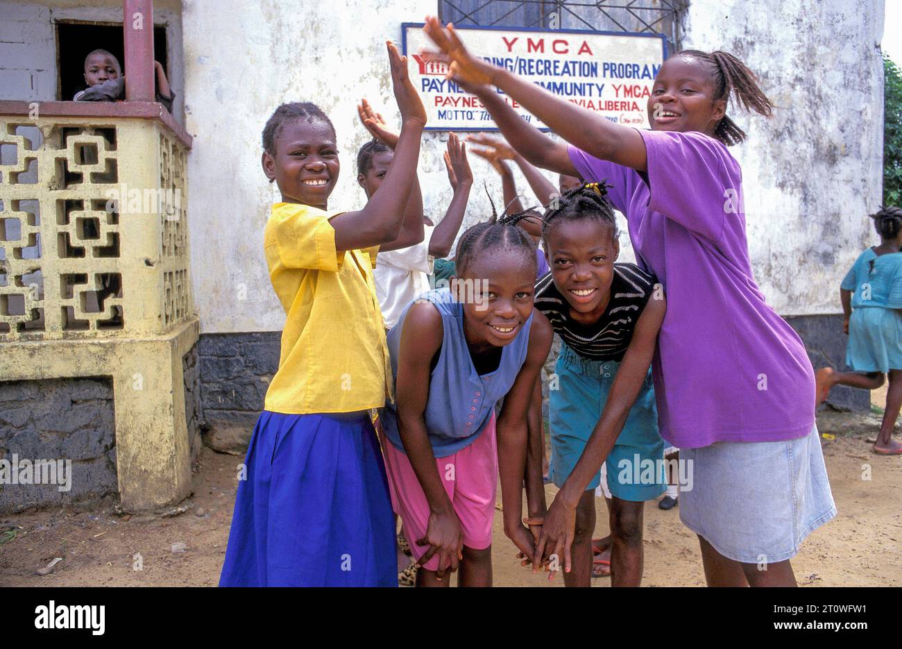 Liberia, Harbel; children playing a game outside at the YMCA Stock ...