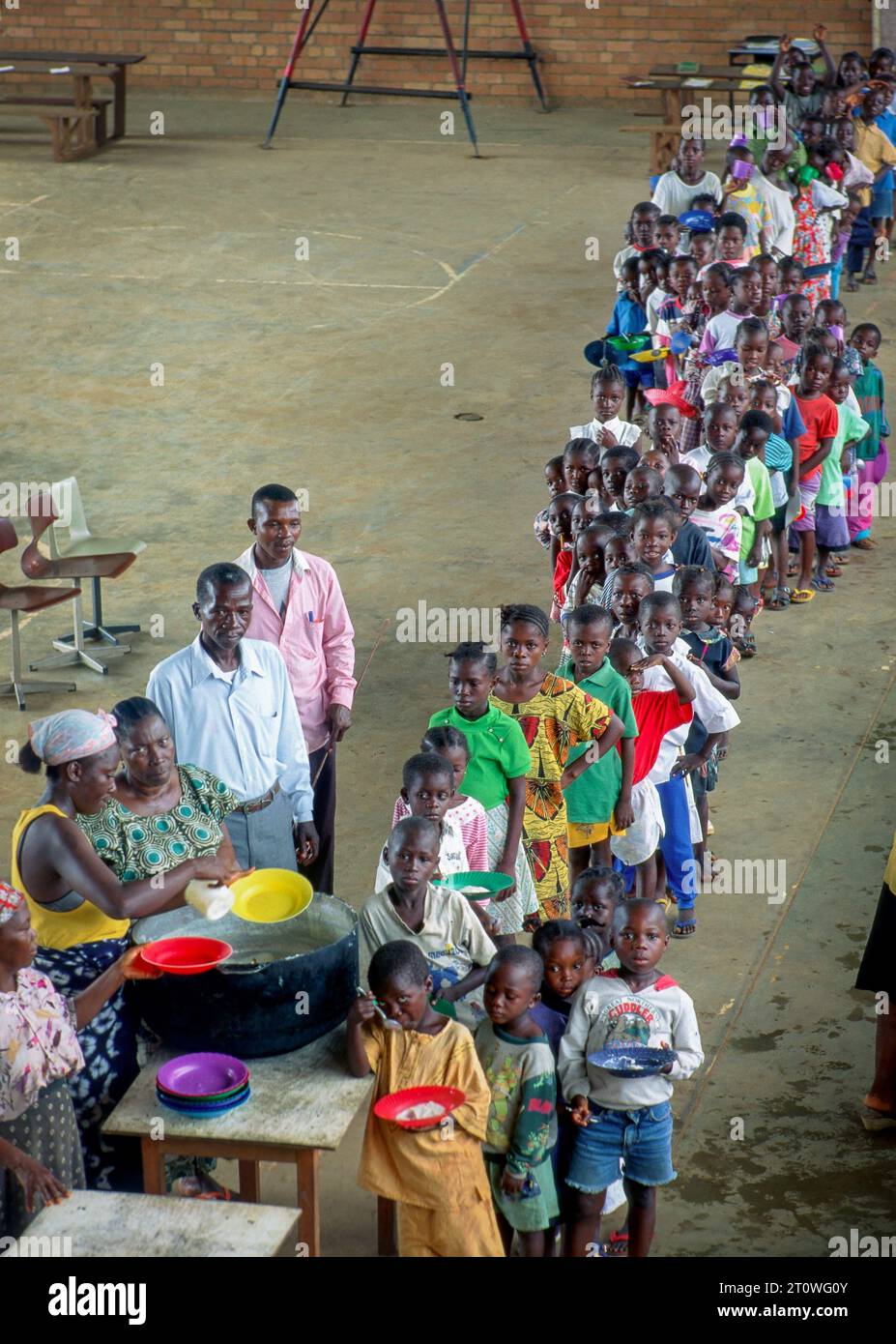 Liberia, civel war orphans at food distribution Stock Photo - Alamy