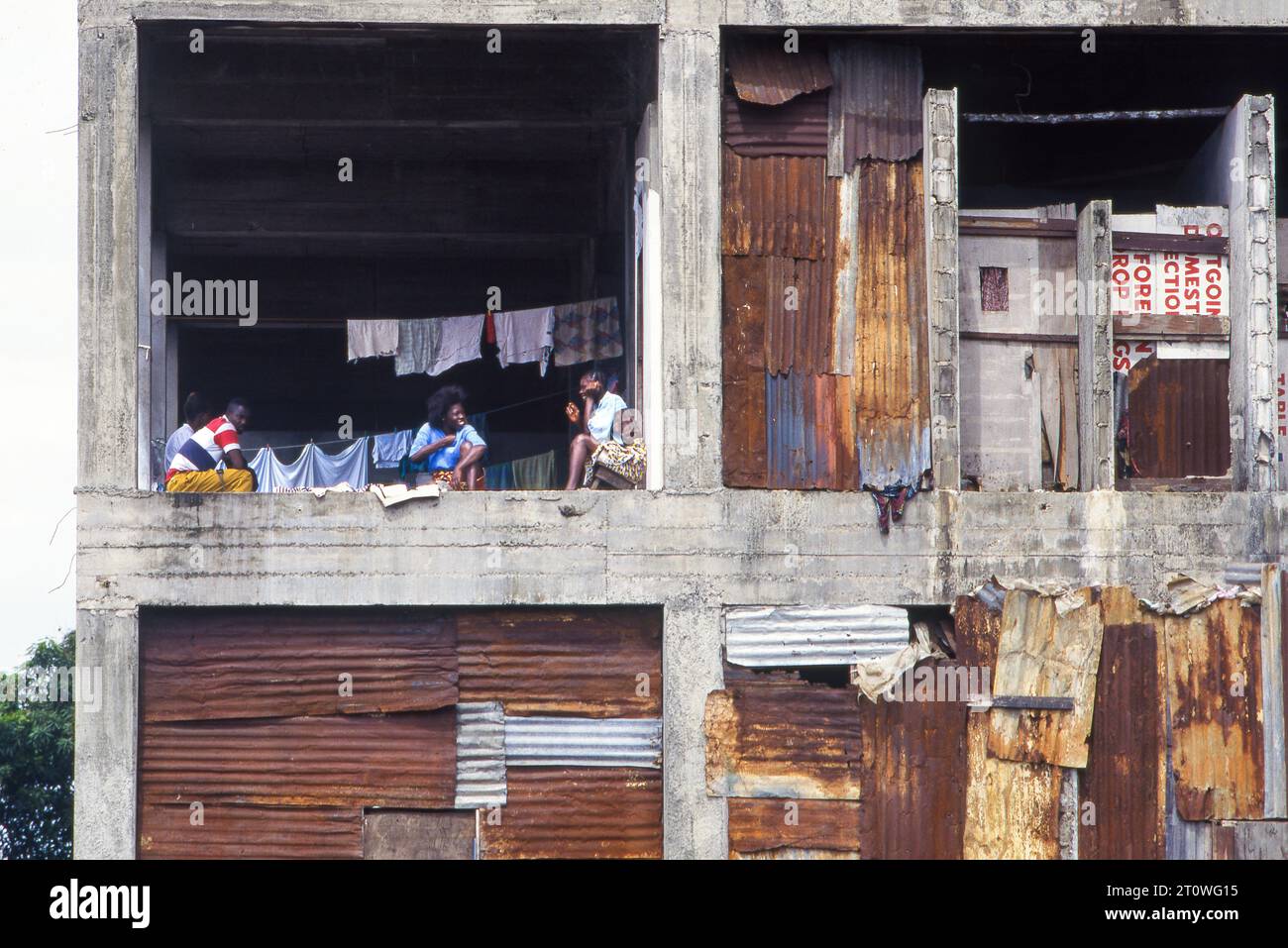 Liberia, Monrovia - an apartment building damaged during the civil war ...