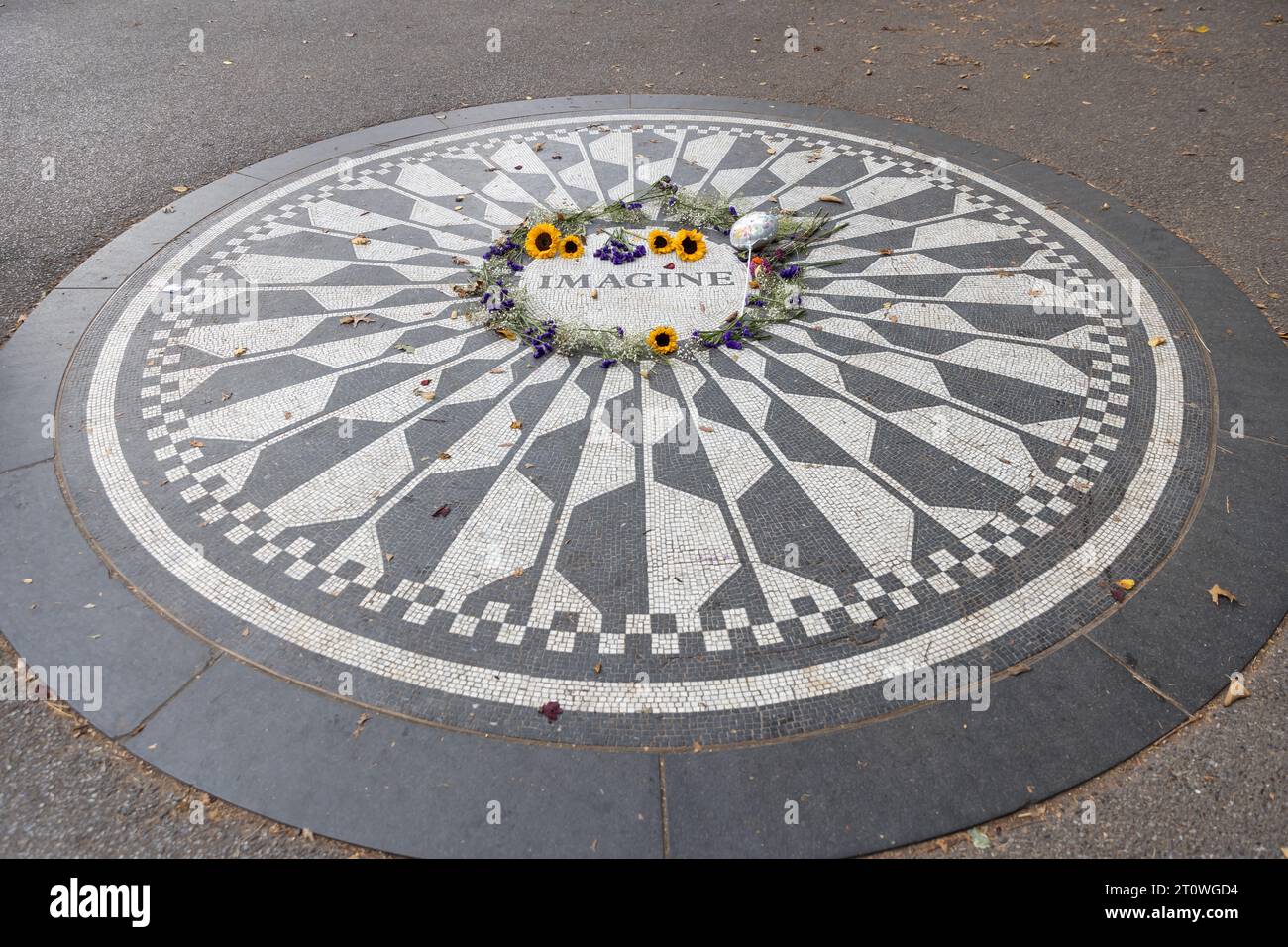 John Lennon flowers fill the Imagine memorial at Strawberry Fields ...