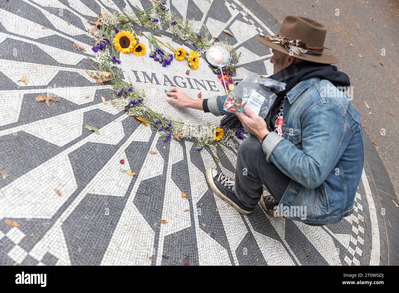 John Lennon flowers fill the Imagine memorial at Strawberry Fields ...