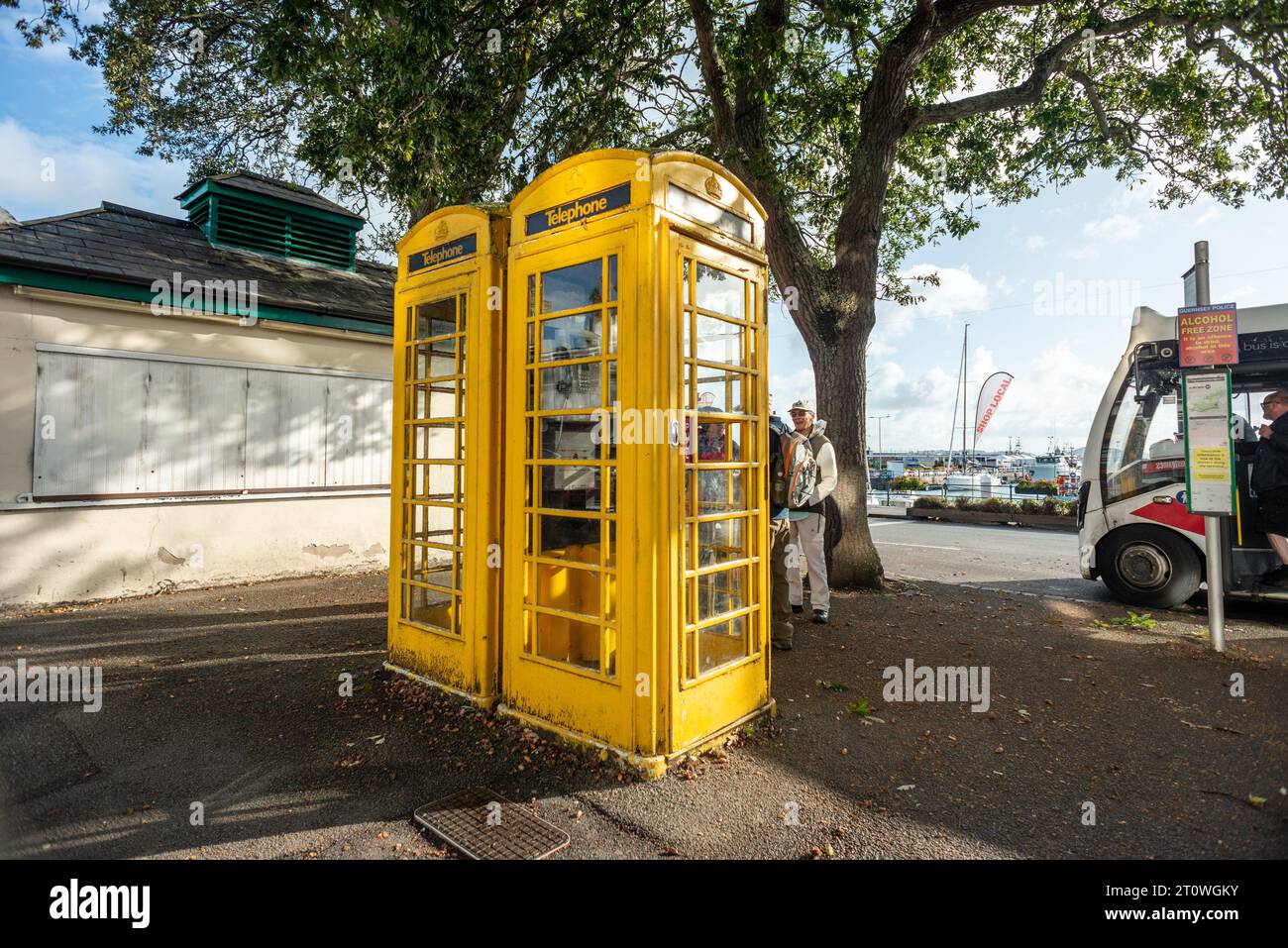 Yellow telephone boxes hi-res stock photography and images - Alamy