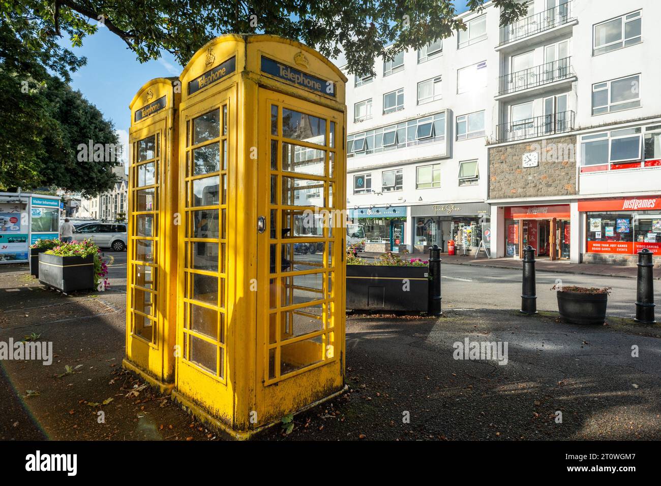 Guernsey, October 3rd 2023: Yellow telephone boxes in St Peter Port ...