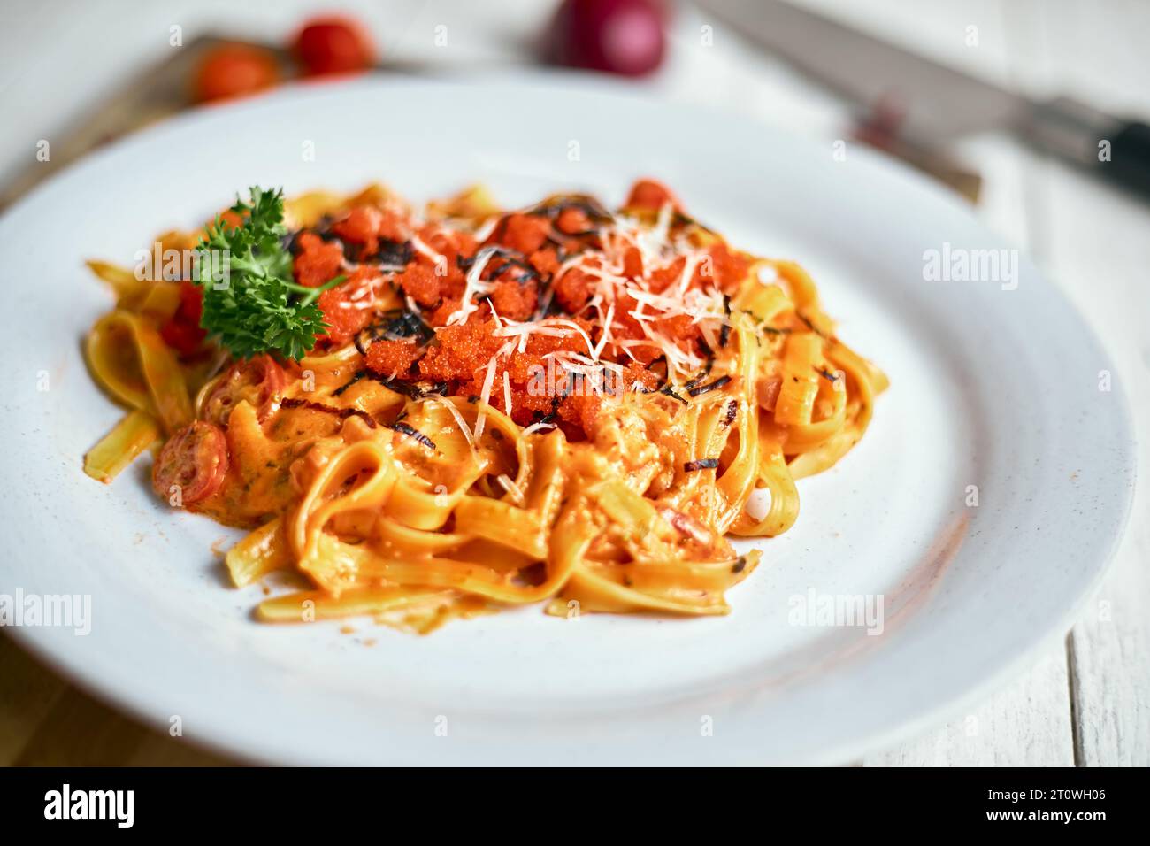 creamy sauce pasta with ebiko , selective focus Stock Photo - Alamy
