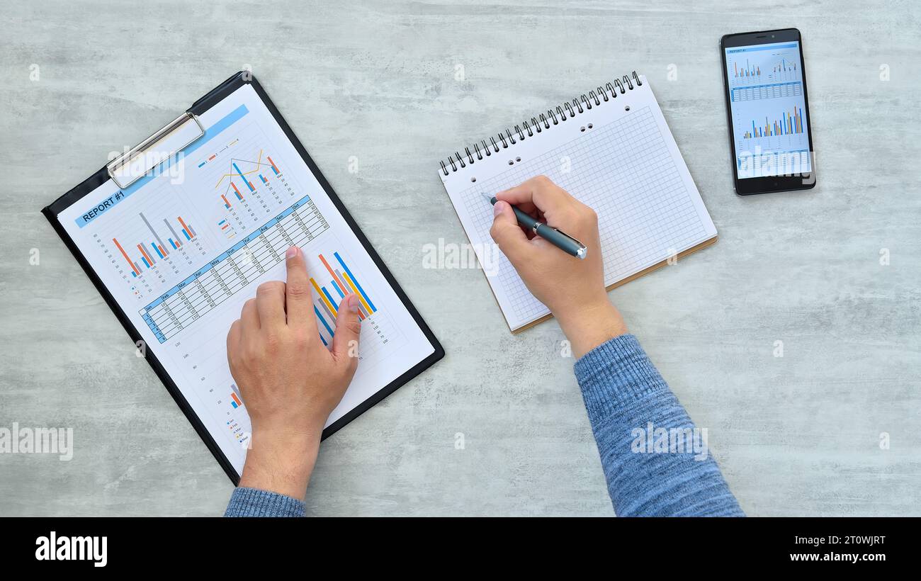 Trader hand checking profits drawing hi-res stock photography and ...