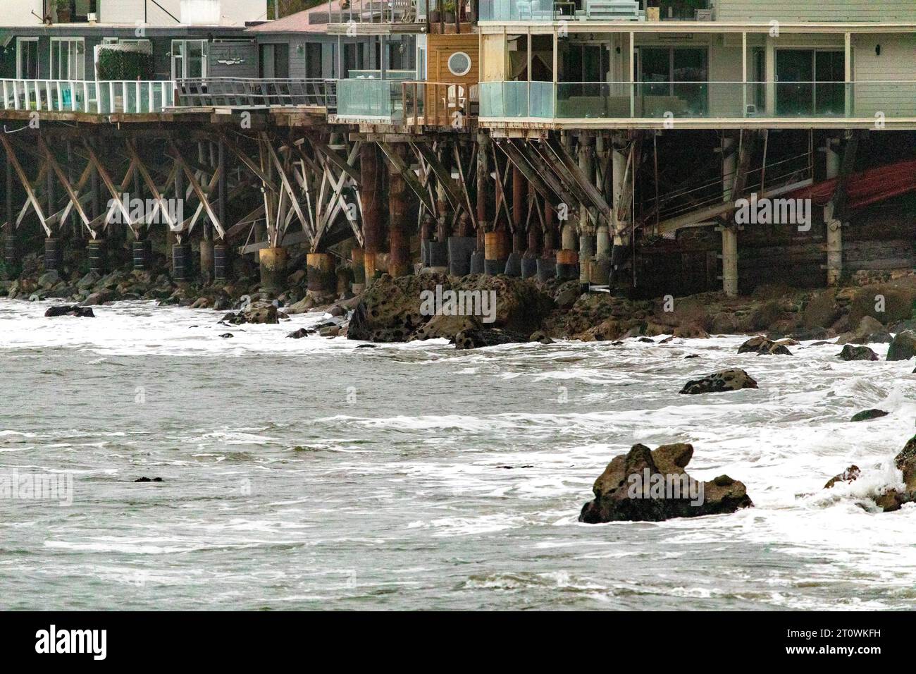 Malibu pier houses that rest on the Pacific Ocean in the state of ...