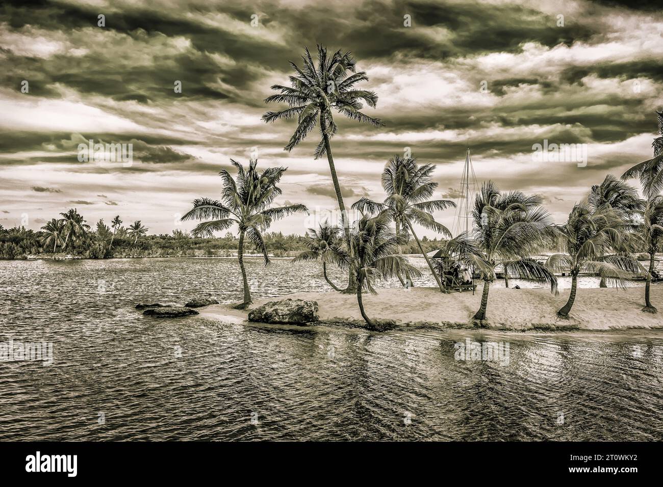 Man made sandy beach island in the Caribbean at Camana Bay, Grand ...