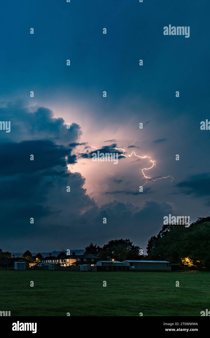 Thunderstorm with lightning striking over the small Welsh town of ...