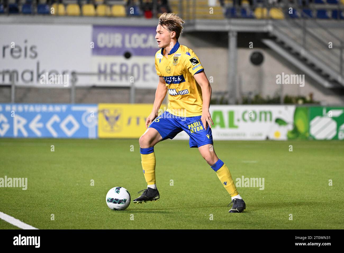 Matte Smets of STVV in action with the ball during a football game ...