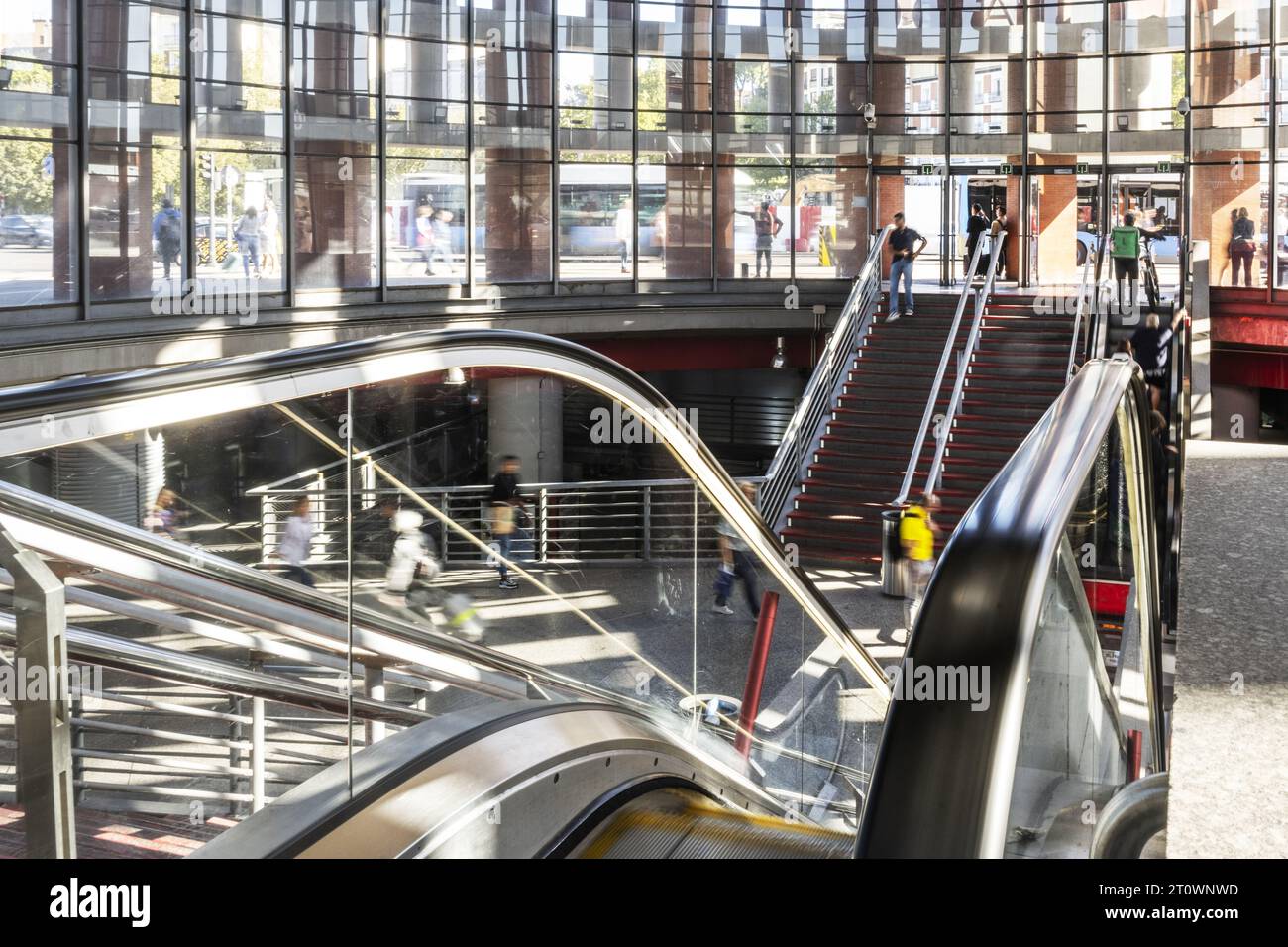 Interior roundabout with normal stairs and metal stairs with public ...