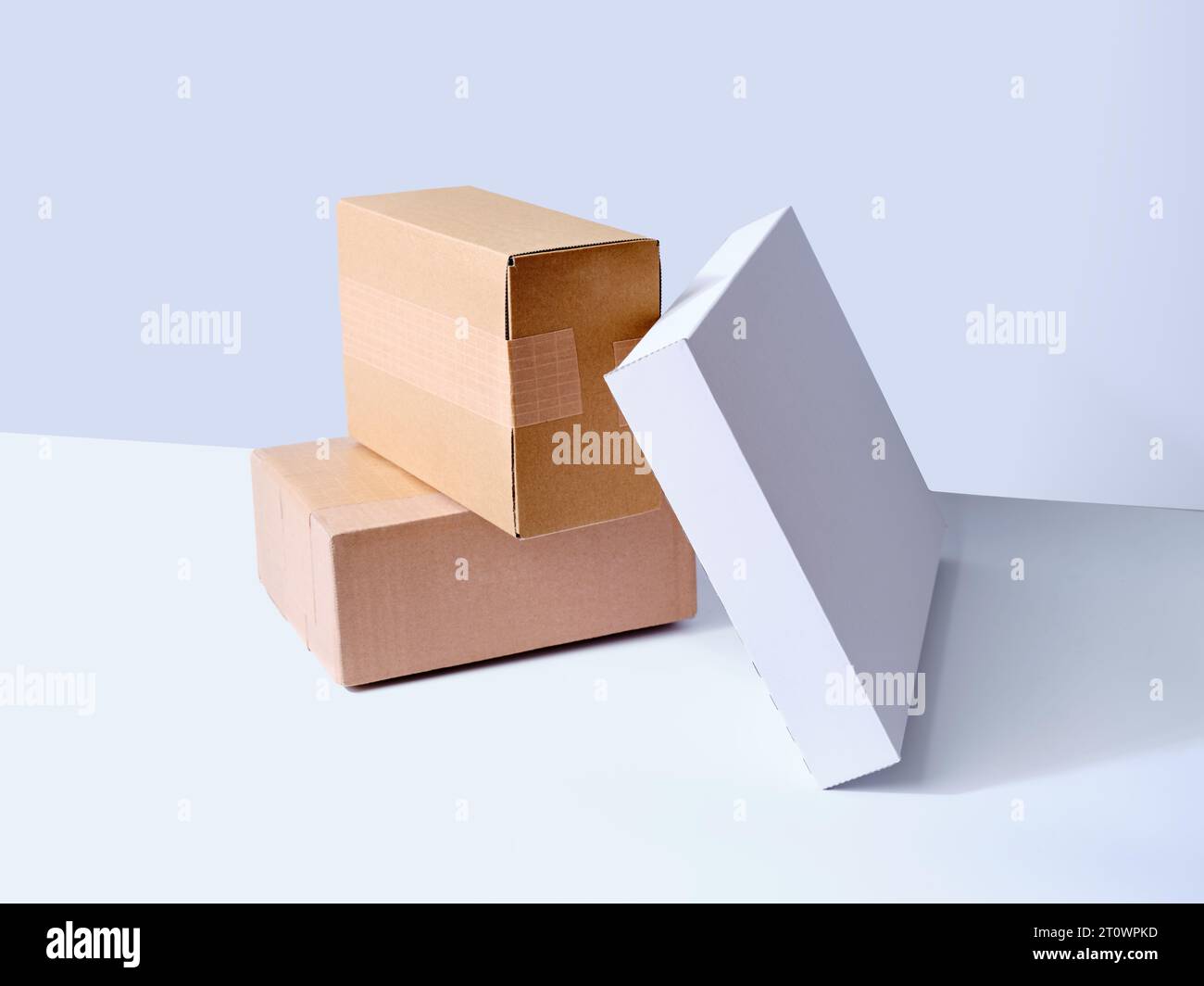 Stack of cardboard parcels Stock Photo - Alamy