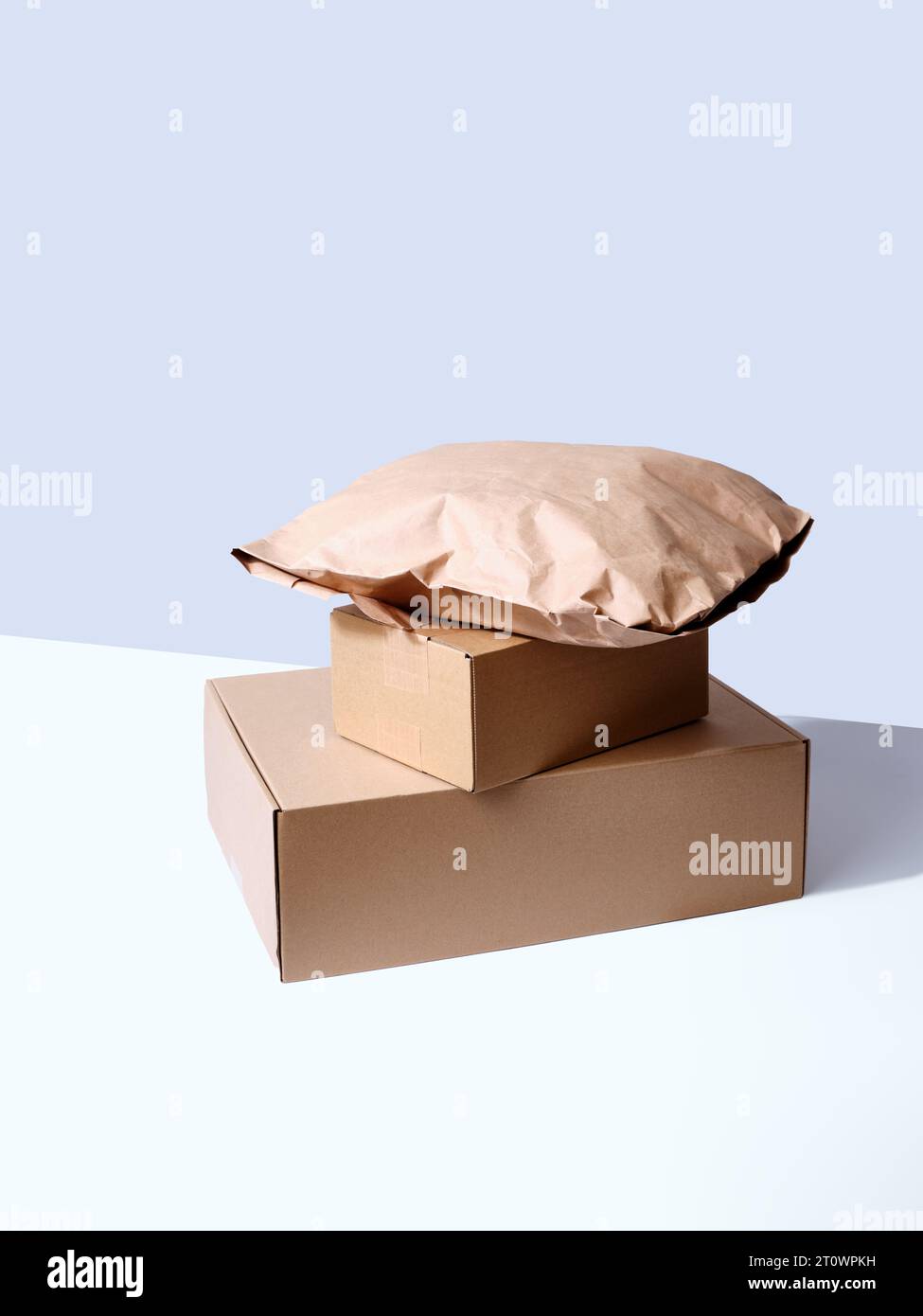 Stack of cardboard parcels Stock Photo - Alamy