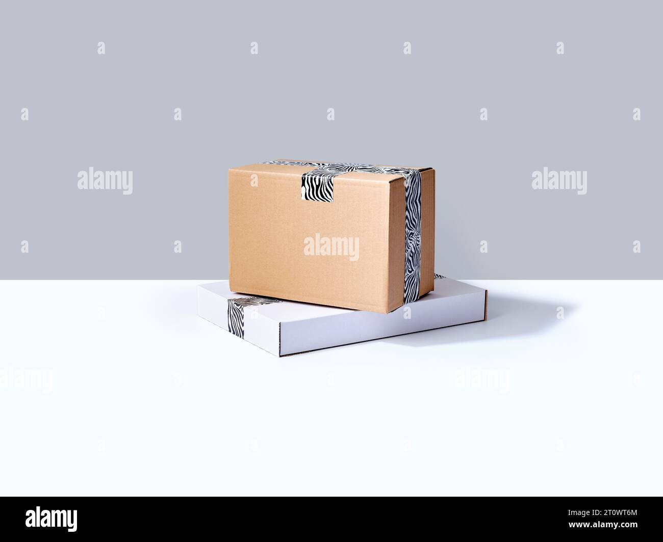 Stack of cardboard parcels Stock Photo - Alamy