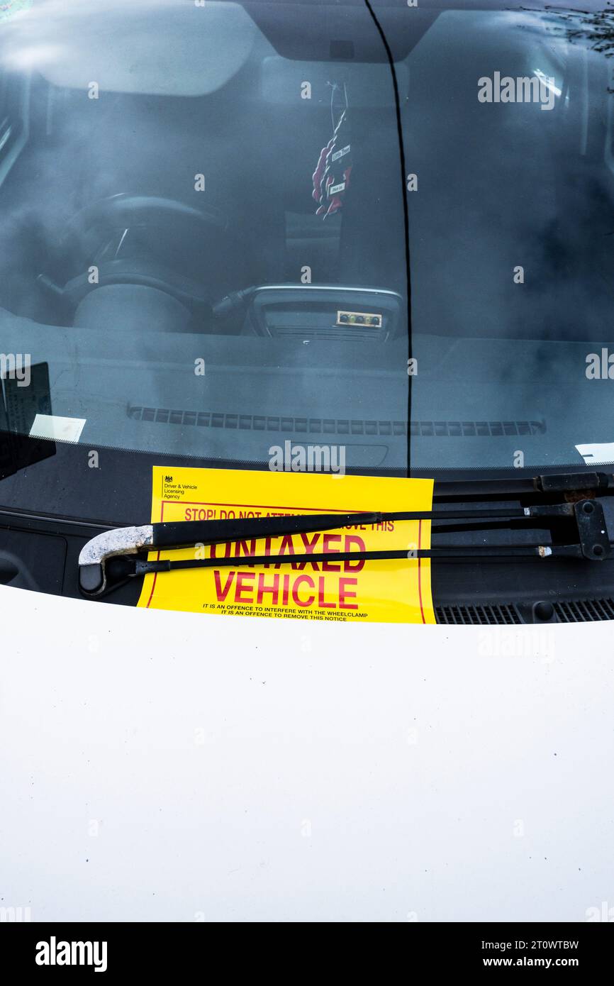 A sign for an untaxed parked vehicle on a windscreen in Newquay in ...