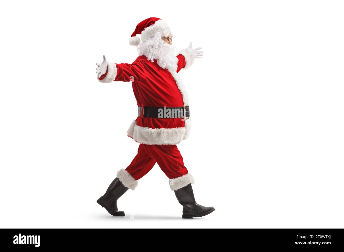 Full length profile shot of santa claus walking with arms wide open ...