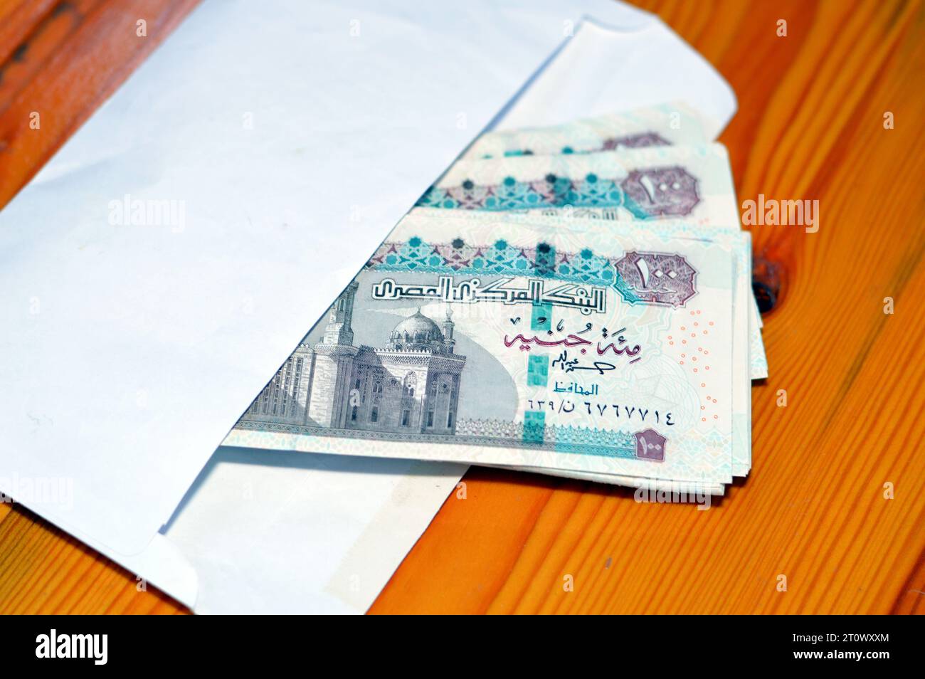 Stack of Egyptian currency of 100 EGP LE 2023 one hundred Egyptian ...