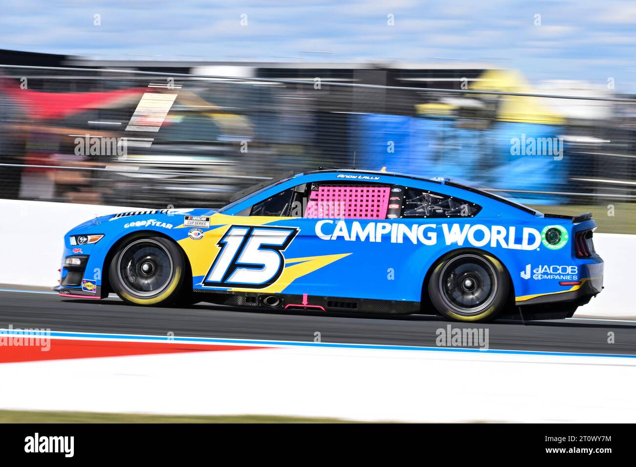 Andy Lally (15) steers into Turn 6 during a NASCAR Cup Series auto race ...