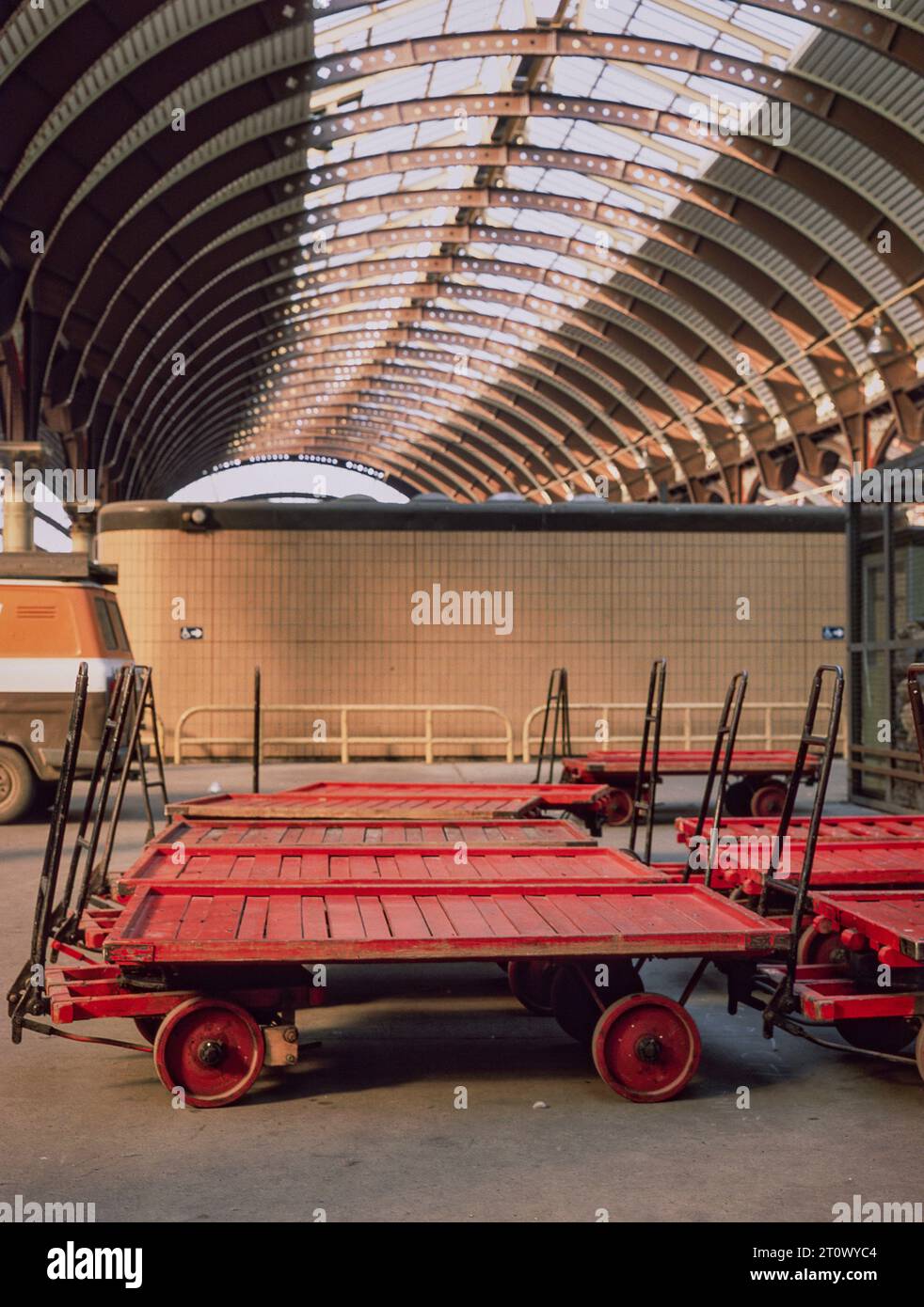 Postal Trolleys at a railway station Stock Photo - Alamy