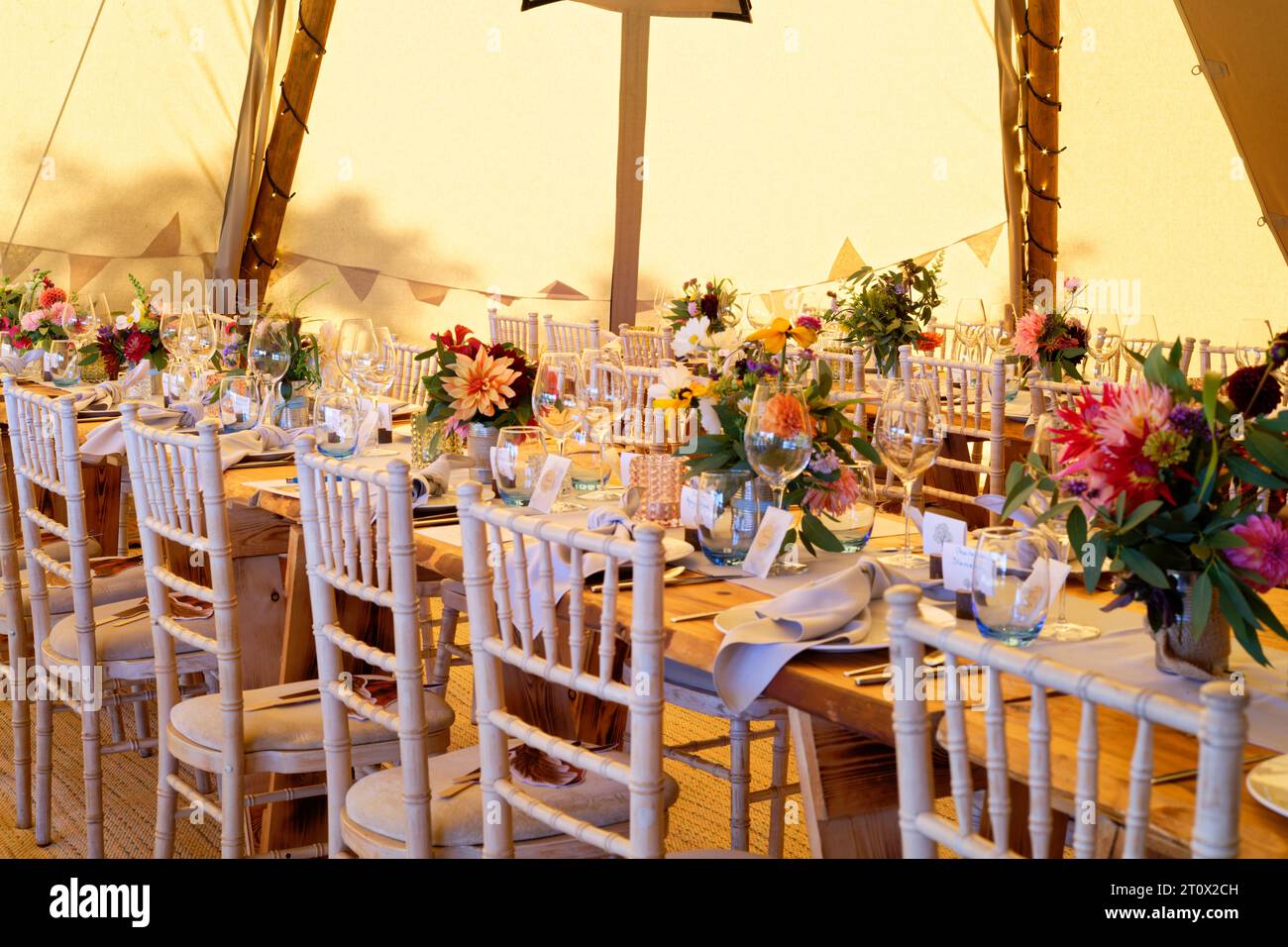 Wedding marquee decorated and ready for the guests to arrive. Tables ...