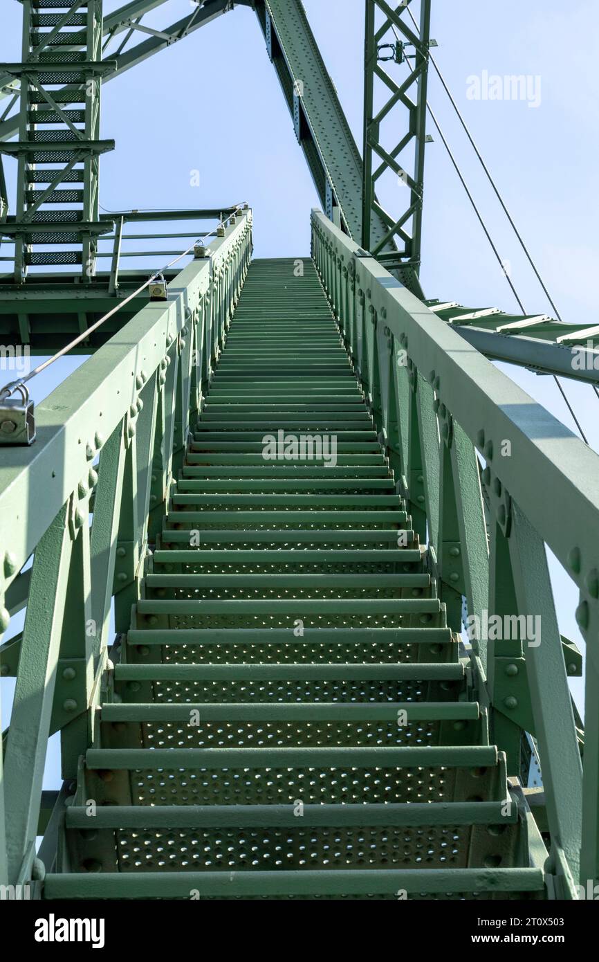Low angle view of the steel steep steps of vertical-lift rail bridge De ...