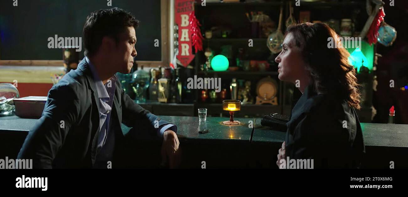 DARK ASSET, from left: Byron Mann, Erica Munoz, 2023. © Saban Films ...