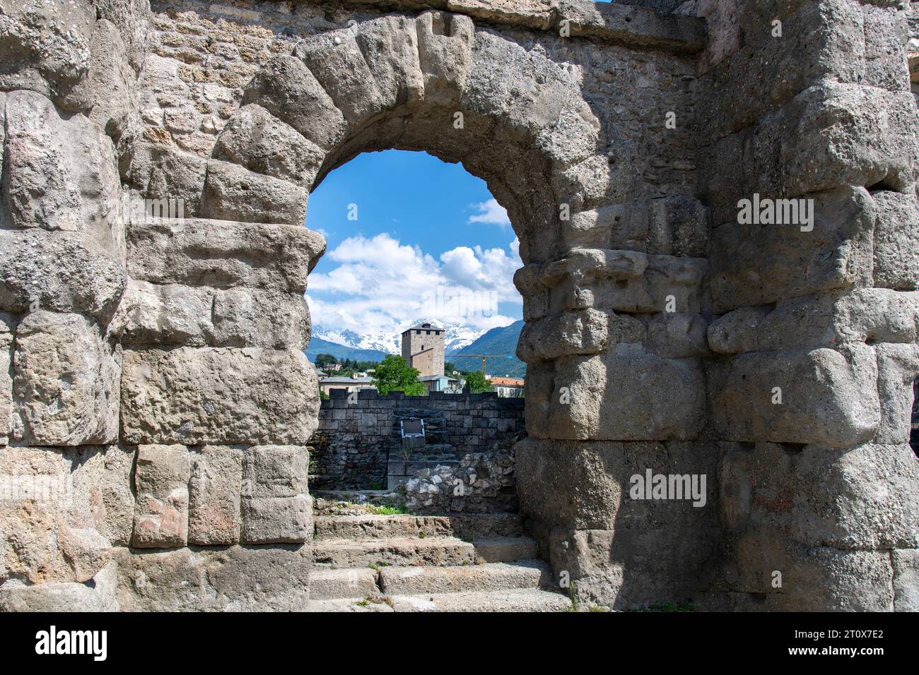 View through one of the arches of the ancient Roman Theatre in Aosta ...