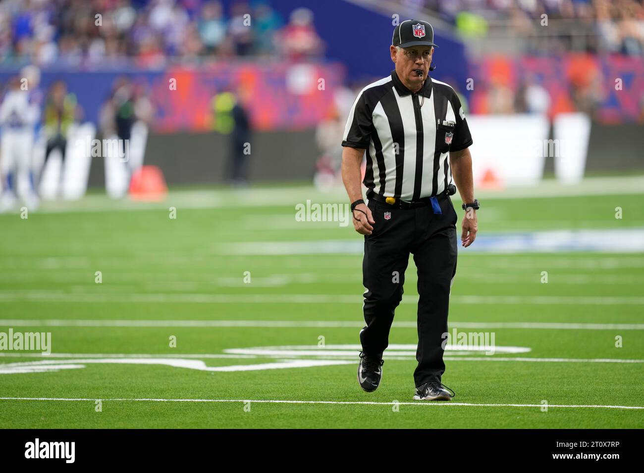 Line judge Jeff Seeman (45) walks on the field during an NFL football ...