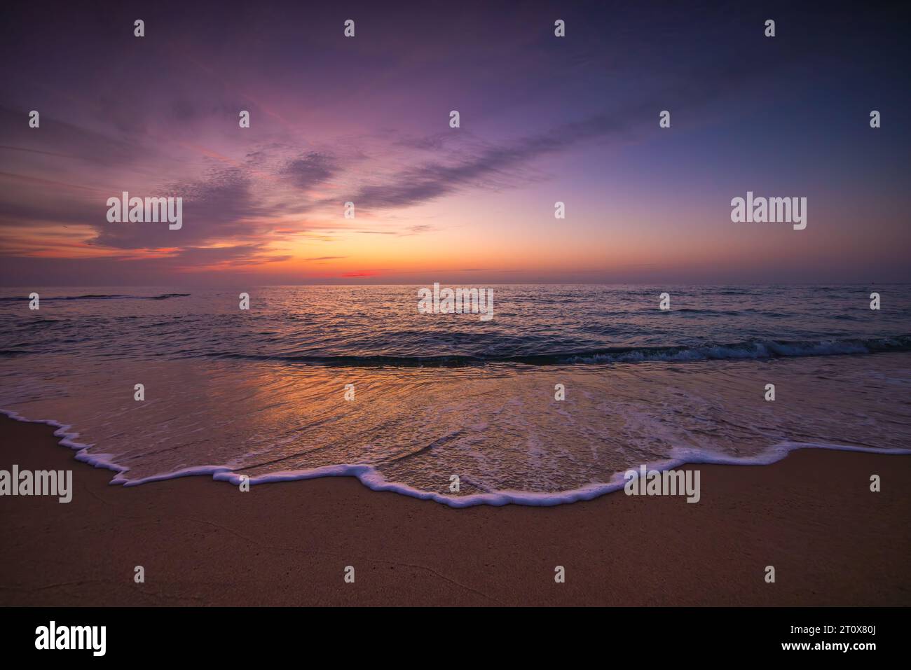 Beautiful cloudscape over the sea wave and beach shore, scenic sunrise ...