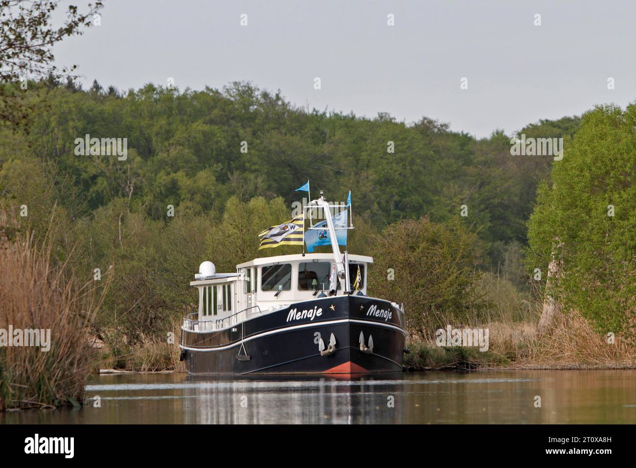 Residential boat on the Peene, Peene Valley River Landscape nature park ...