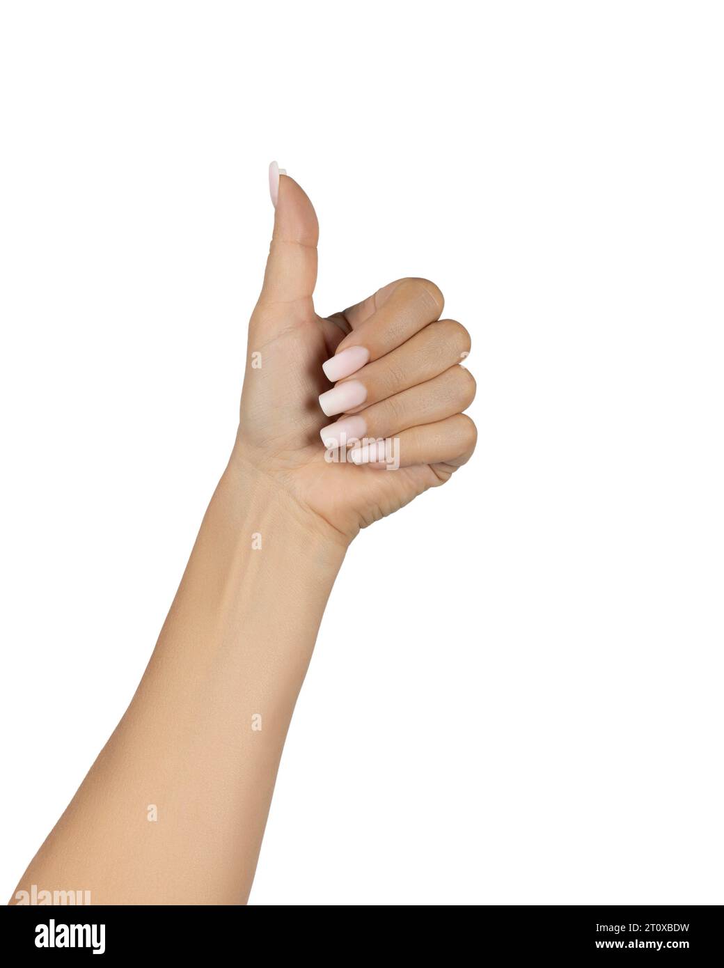 Adult female hand with long square ombre manicured nails, in thumbs up ...
