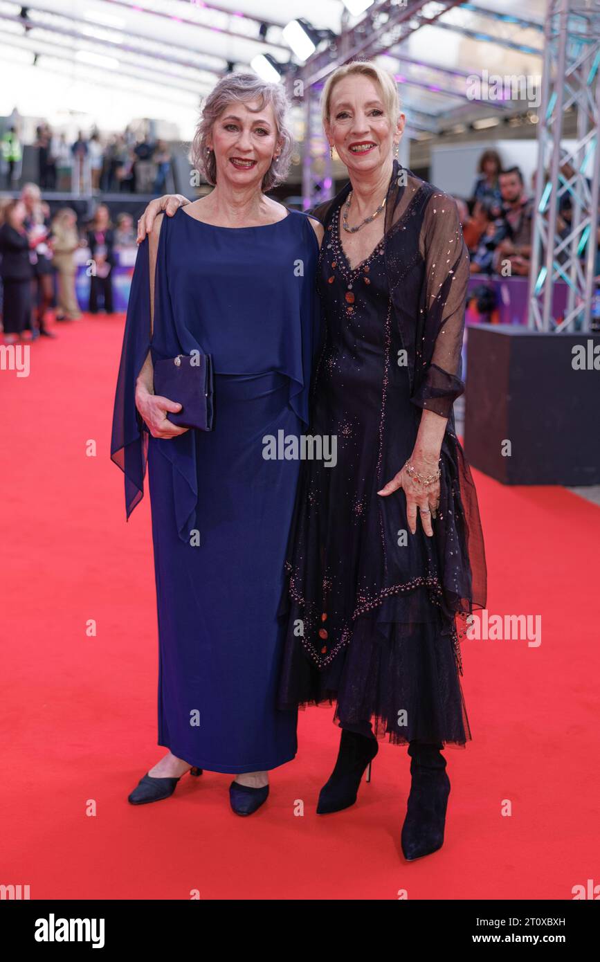 Jamie Bernstein, right, and Nina Bernstein pose for photographers upon ...