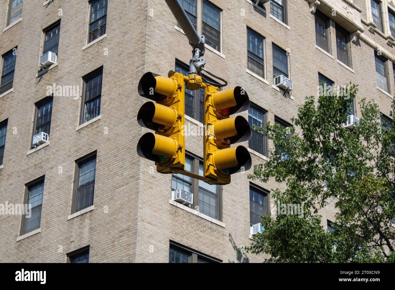 A low angle of a traffic light on the street in Brooklyn, New York on a ...