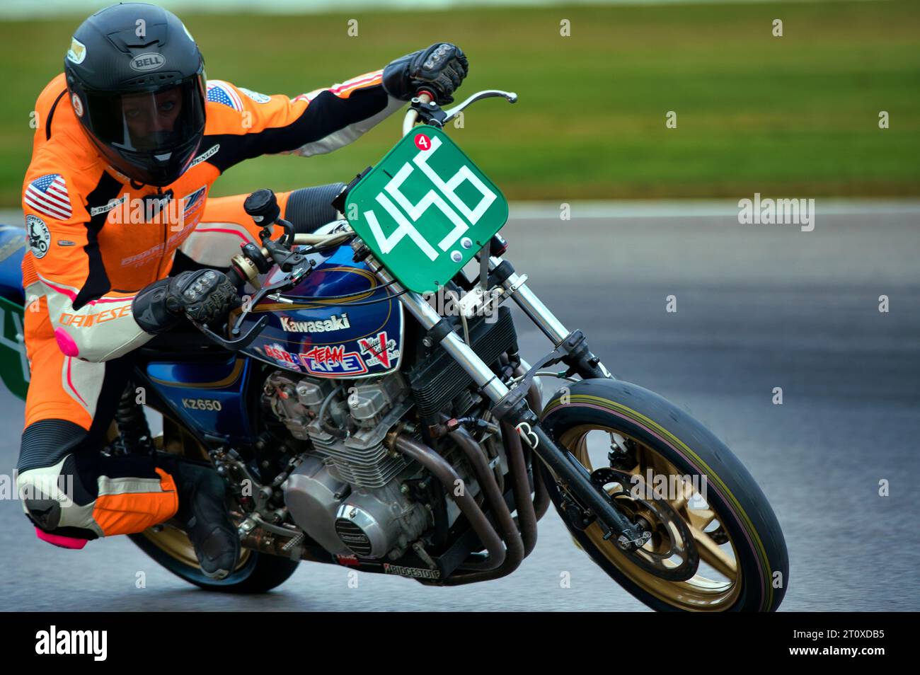 Vintage motorcycles run laps on the track at Barber Motorsports in ...