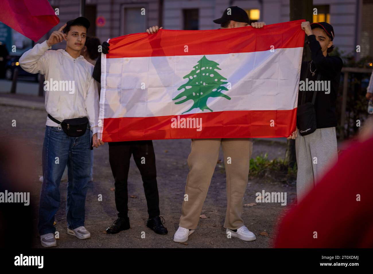 Duisburg, Germany. 09th Oct, 2023. Youth wave the Lebanese flag and ...