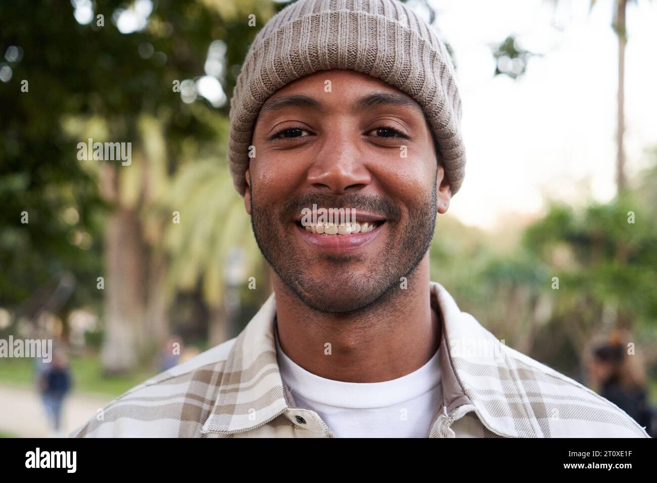 Portrait of multiracial man smiling and looking at camera Stock Photo ...