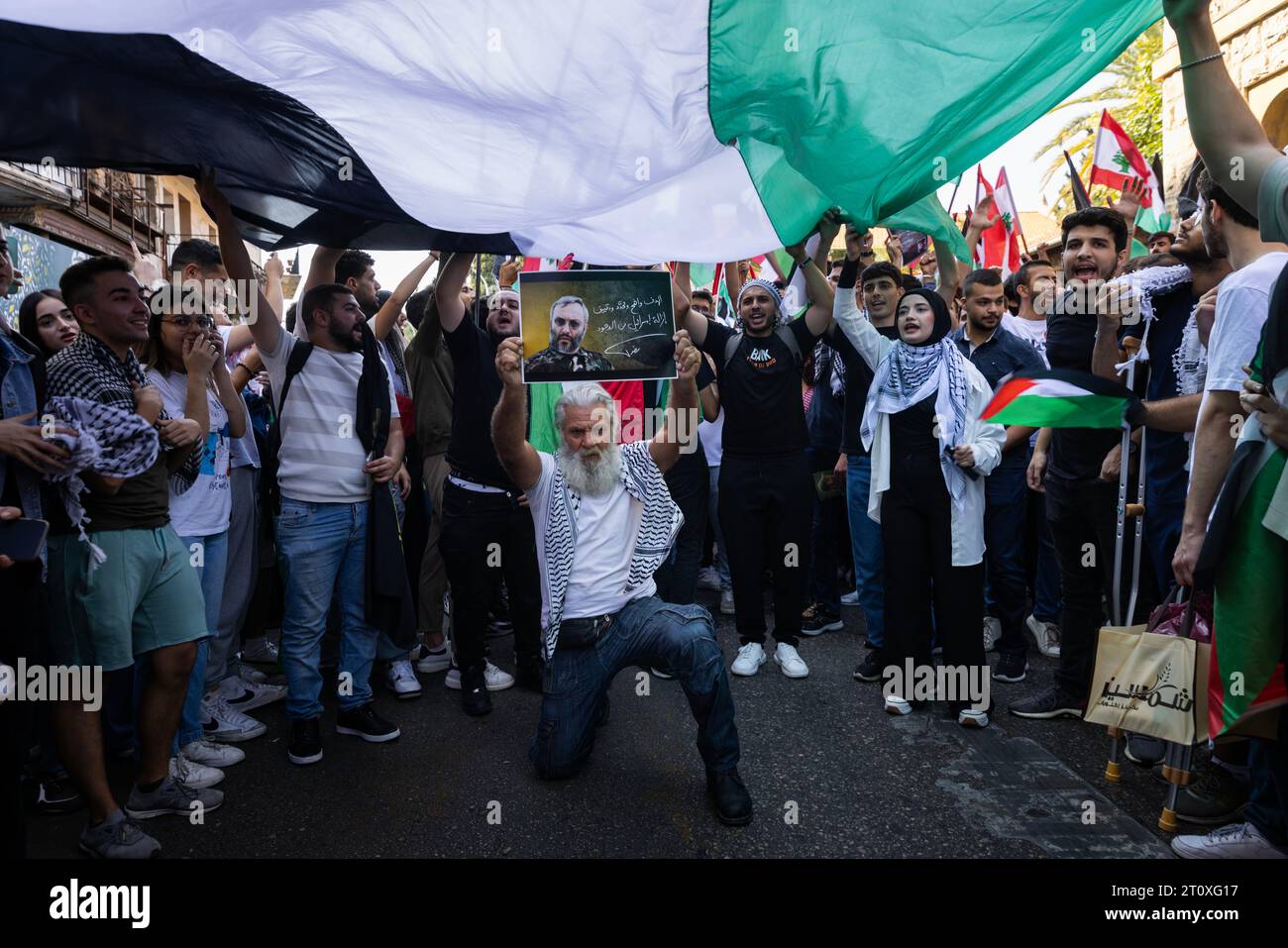 Beirut, Beirut, Lebanon. 9th Oct, 2023. A man holds a picture of Imad ...
